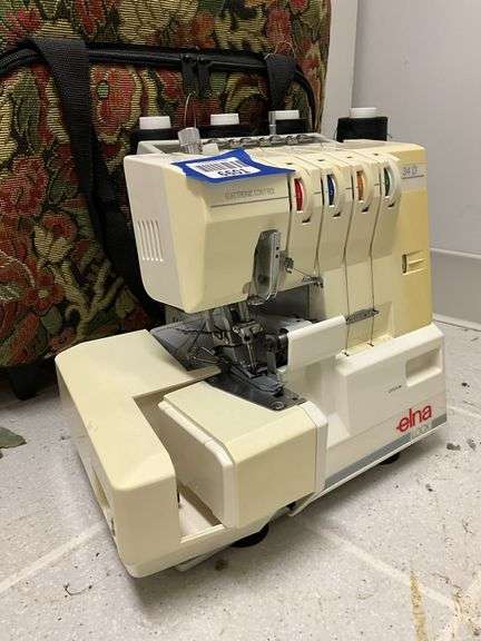 Elna Lock 34D serger sewing machine, tapestry bag - Hurley Real Estate ...