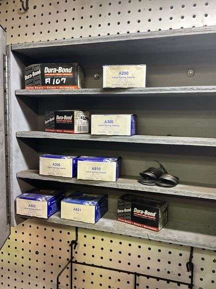 Lot of valve spring inserts w/ display cabinet - Hurley Real Estate ...