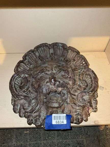 Stylized face plaque - Hurley Real Estate & Auctions