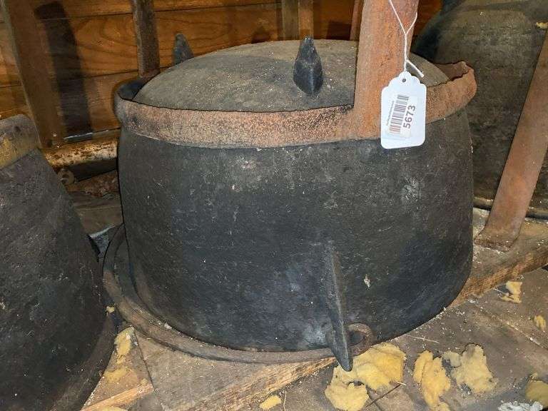 Cast iron butcher kettle w/ stand - Hurley Real Estate & Auctions
