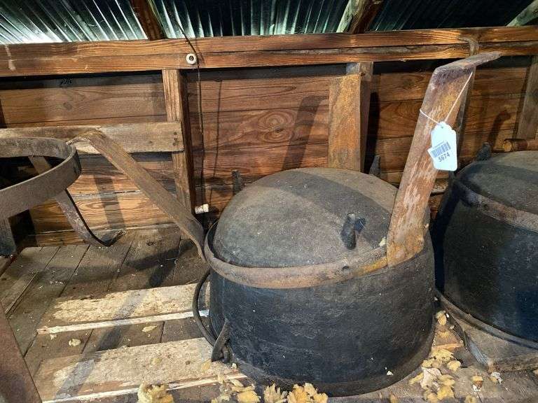Cast iron butcher kettle w/ stand - Hurley Real Estate & Auctions