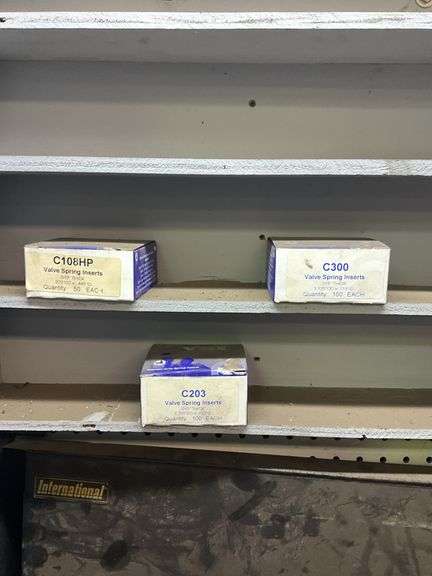 Lot of valve spring inserts w/ display cabinet - Hurley Real Estate ...