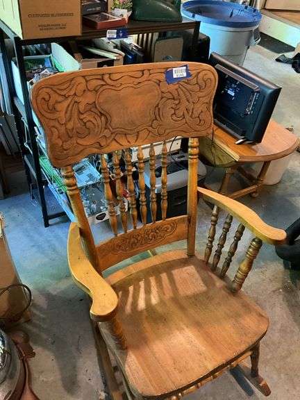 Press carved spindle back rocking chair - Hurley Real Estate & Auctions