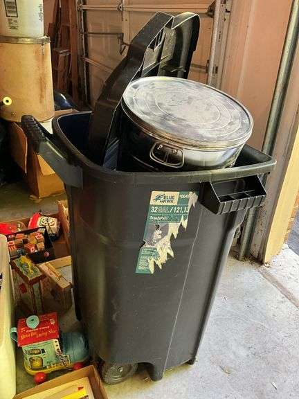 Plastic garbage can and contents - Hurley Real Estate & Auctions