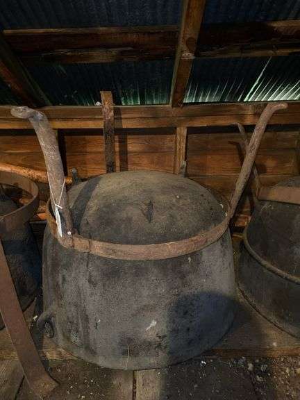 Cast iron butcher kettle w/ stand - Hurley Real Estate & Auctions