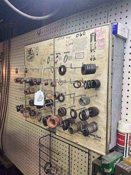 Lot of valve spring inserts w/ display cabinet - Hurley Real Estate ...