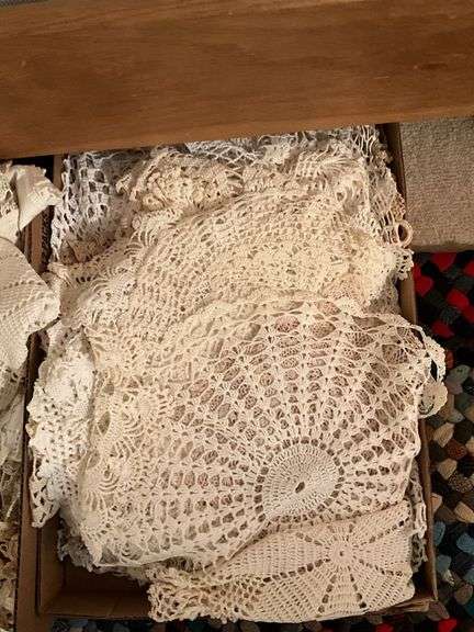 Two boxes of crocheted doilies - Hurley Real Estate & Auctions