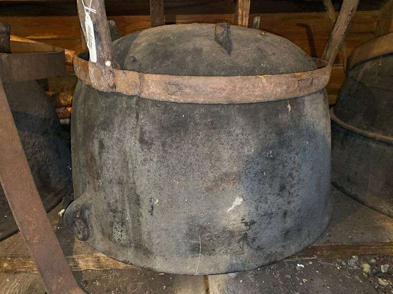 Cast iron butcher kettle w/ stand - Hurley Real Estate & Auctions