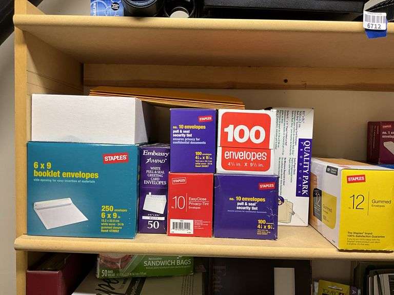 Contents of shelf: various envelopes - Hurley Real Estate & Auctions