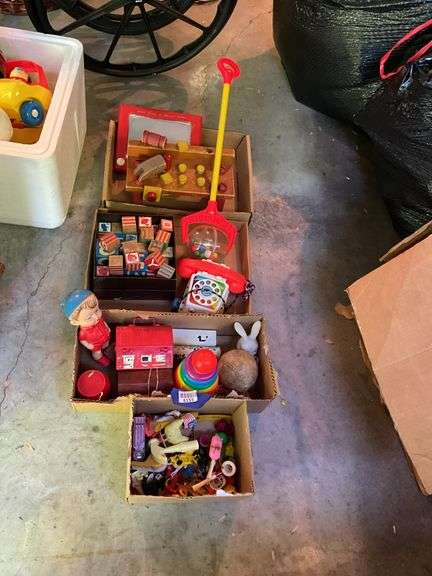 Vintage toys including: Fisher Price, Etch-a-sketch, blocks, Playskool ...
