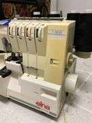 Elna Lock 34D serger sewing machine, tapestry bag - Hurley Real Estate ...
