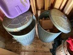 Two galvanized garbage cans w/ wood contents - Hurley Real Estate & Auctions