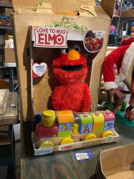 Melissa & Doug Winnie the Pooh train in package, Love to Hug Elmo in ...