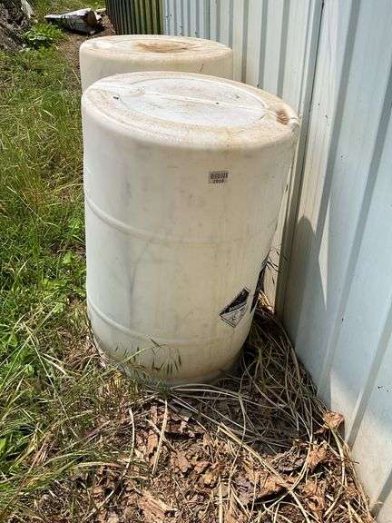 Two plastic drums - Hurley Real Estate & Auctions