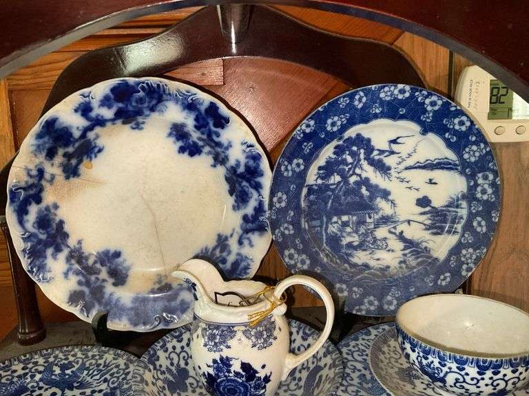 Contents of two shelves: blue & white china including flow blue ...