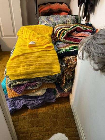 Large lot of handcrafted afghans - Hurley Real Estate & Auctions