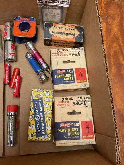 Vintage flashlights, lightbulbs, batteries, including Rayovac bullet ...