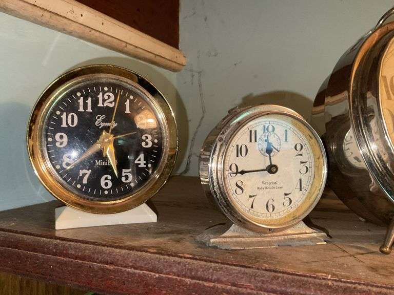 Three vintage alarm clocks, American eagle ashtray and figurines, multi ...