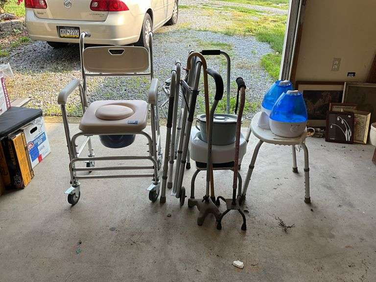 Handicap items including: transport potty chair, walkers, quad-canes ...