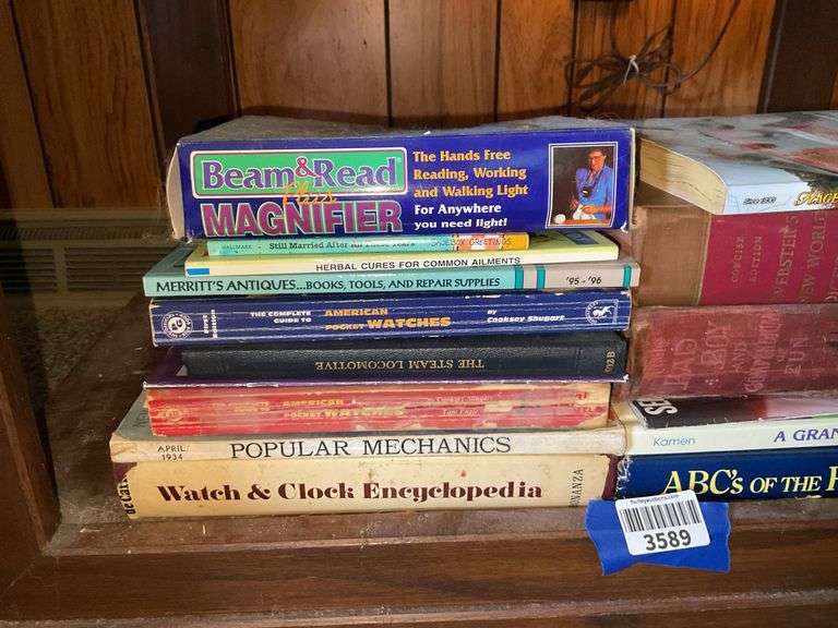 Lighted magnifier and books lot: clocks & watches, steam locomotive, Hagerstown directory ...