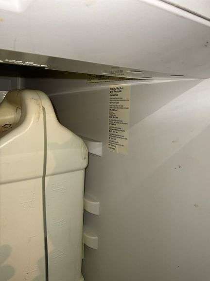 Whirlpool Conquest refrigerator freezer w/ ice dispenser, and contents ...