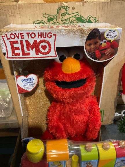 Melissa & Doug Winnie the Pooh train in package, Love to Hug Elmo in ...