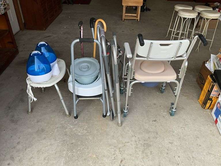 Handicap items including: transport potty chair, walkers, quad-canes ...