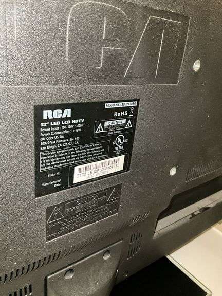 All contents in/on shelf and box on floor: RCA 32” TV, phones, digital ...