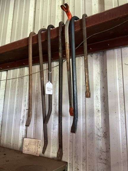 Crowbars hanging on wall - Hurley Real Estate & Auctions