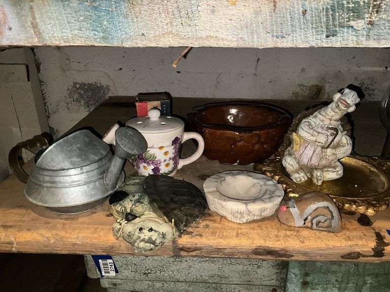 Contents on and under table: turtle figures, table fountain, watering ...