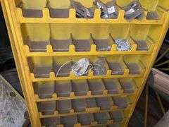 Yellow hardware unit w/ contents - Hurley Real Estate & Auctions