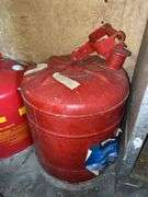 Two metal fuel cans: 1st can full, 2nd can partially full, and oil drain pan - Hurley Real ...