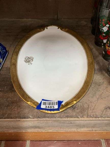 Limoges/ France etched gold border platter and eight plates, w ...