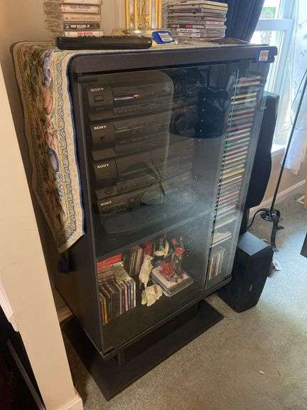 Sony component stereo system in cabinet w/ speaker set and CD, misc ...