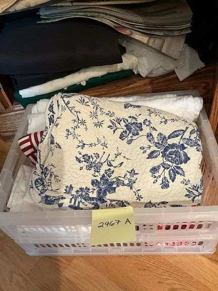 Tote of tablecloths, linens - Hurley Real Estate & Auctions