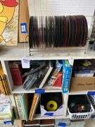 45rpm records on wire rack, Sim Mania 2 video games, other video games ...