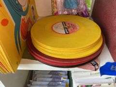 45rpm records on wire rack, Sim Mania 2 video games, other video games ...