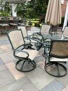 Hexagonal glass top patio table w/ umbrella and set of six arm chairs ...