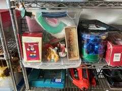 Contents of shelf: Christmas ornaments and decor including: Hallmark ...