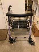 Roller style walker w/ hand brakes - Hurley Real Estate & Auctions