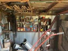 Tire chains, tie down straps, containers of hardware, oil can - Hurley ...