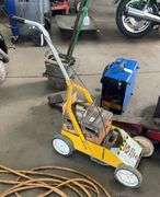 Rustoleum striping machine with cans of striping paint - Hurley Real ...