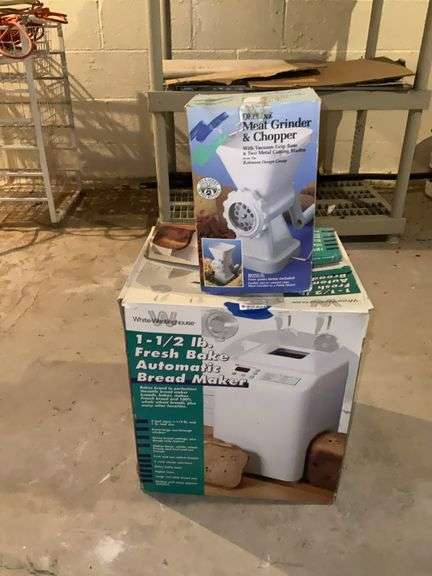 Meat grinder and bread machine in boxes - Hurley Real Estate & Auctions