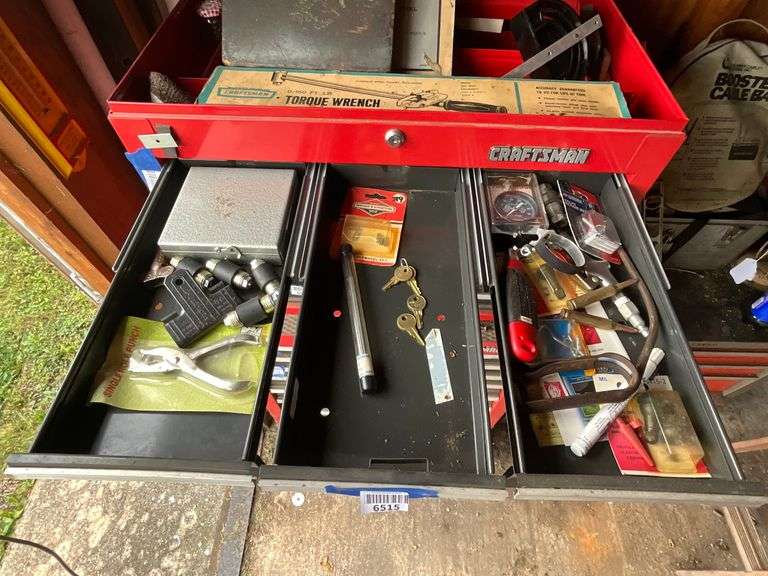 Contents of drawer: Erick Miracle Point protractor, tire gauge, brass ...