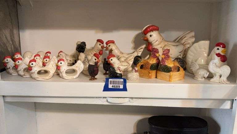 Contents of shelf: chicken theme kitchen decor, figurines, napkin rings ...