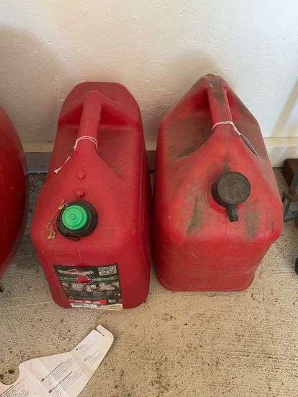 Two plastic gas cans - both full - Hurley Real Estate & Auctions