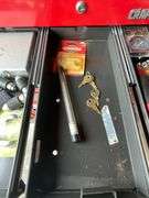 Contents of drawer: Erick Miracle Point protractor, tire gauge, brass ...
