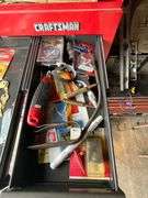 Contents of drawer: Erick Miracle Point protractor, tire gauge, brass ...