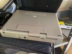 Contents of shelf: NCR & other laptop, Microtest Pentascanner, cases ...