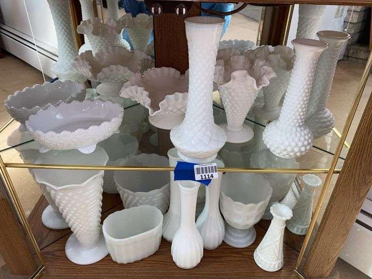 Contents of two shelves: milk glass including hobnail, daisy & button ...